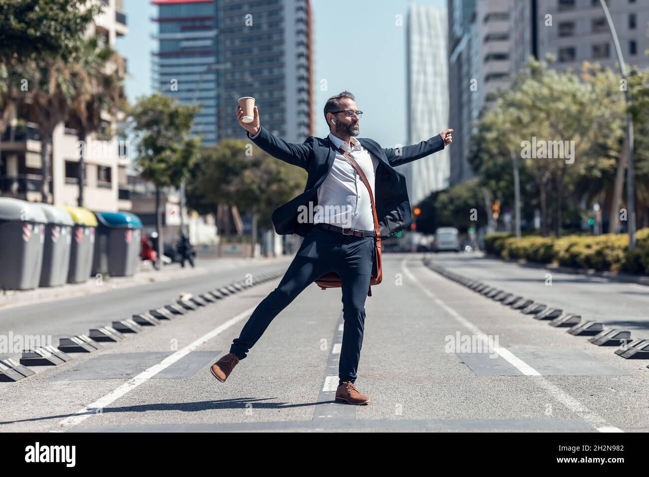 Carefree man dancing arms hi-res stock photography and images - Alamy