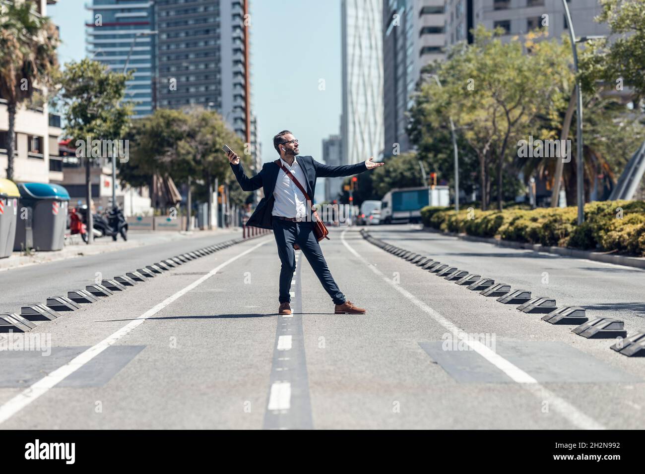 Carefree man dancing arms hi-res stock photography and images - Alamy