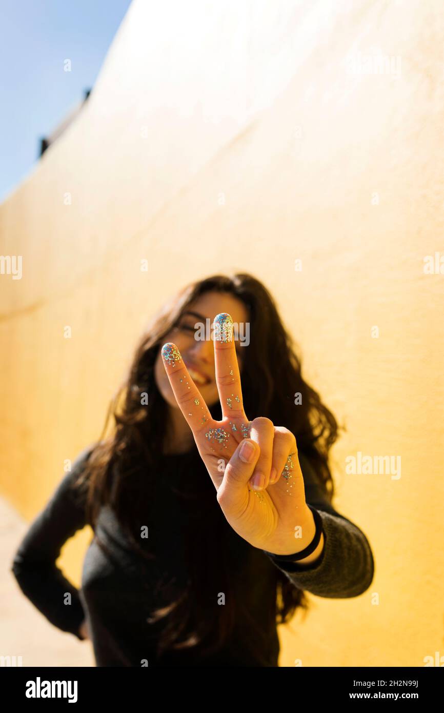 Finger with peace sign hi-res stock photography and images - Alamy