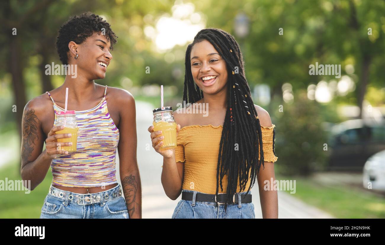 Group multicultural friends raising hi-res stock photography and images ...