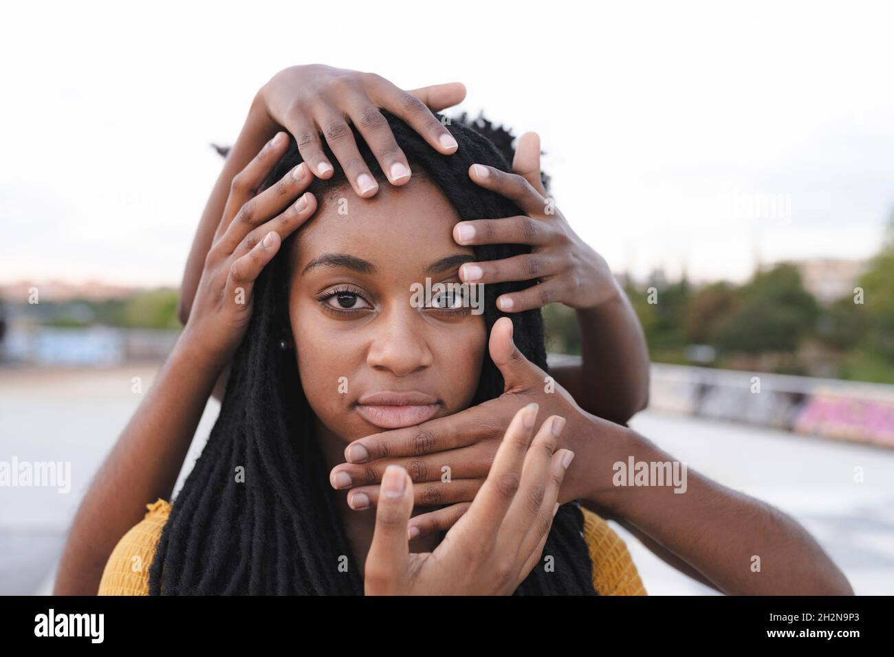 Woman with covered face hi-res stock photography and images - Alamy
