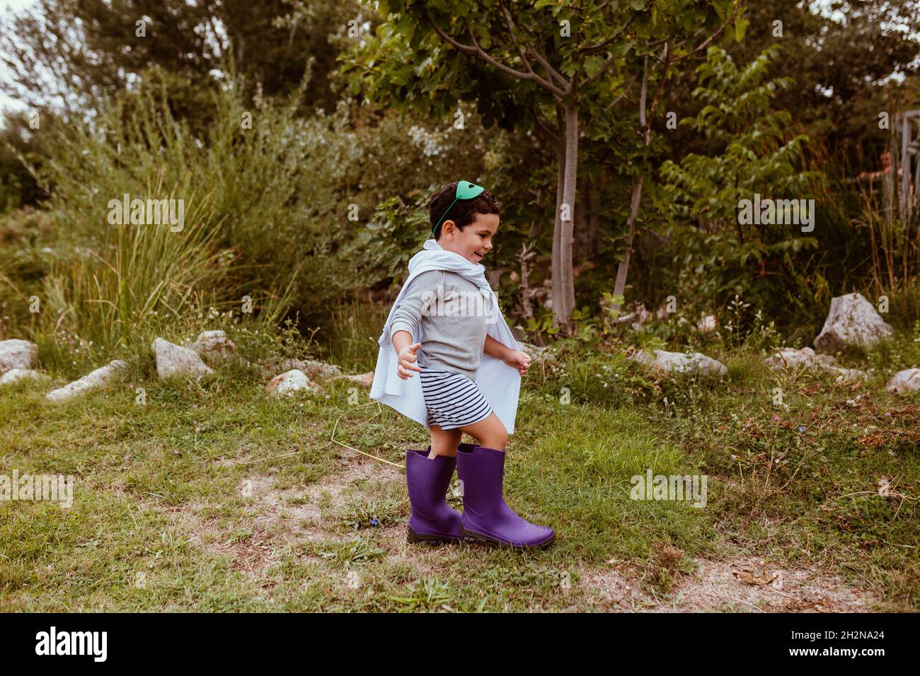 Boy wearing boots hi-res stock photography and images - Alamy