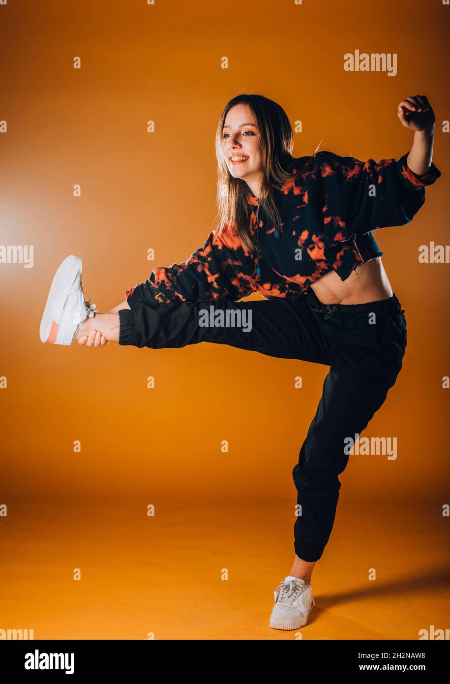 Beautiful girl performing a contemporary dance routine Stock Photo - Alamy