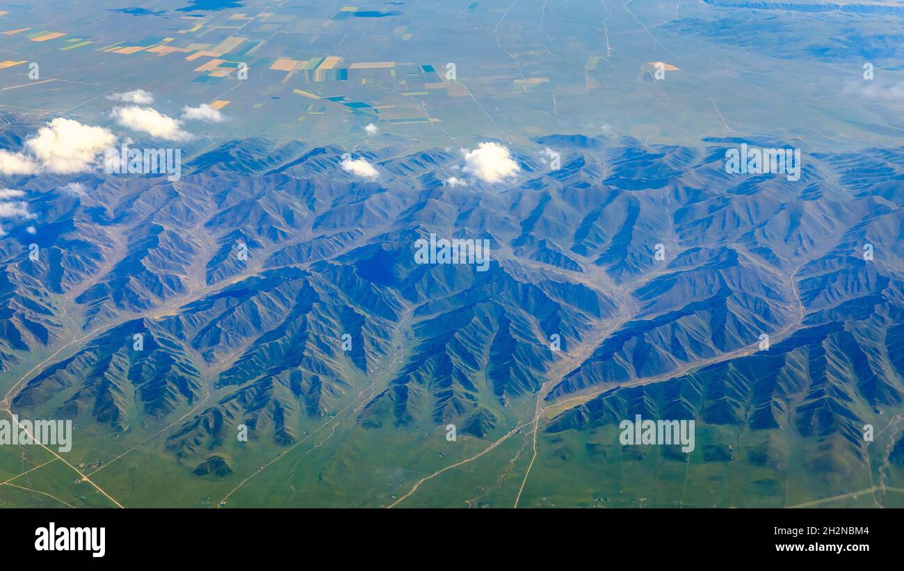 Aerial view of the green mountain scenery Stock Photo - Alamy