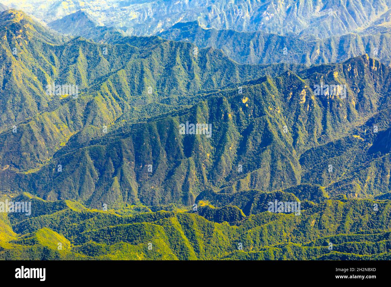 Aerial view of the green mountain scenery Stock Photo - Alamy
