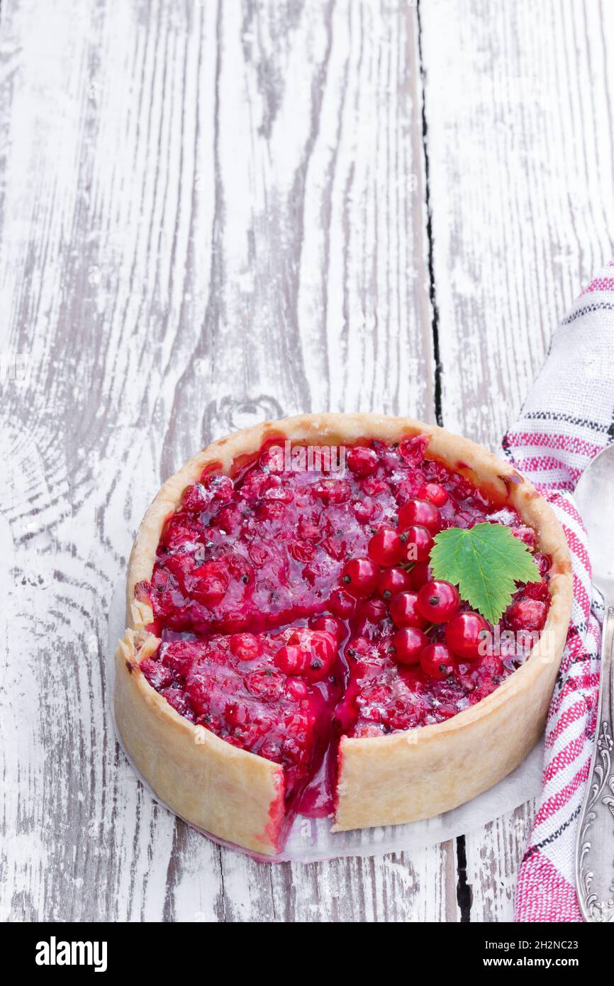 Freshly baked red currant pie on white wooden table Stock Photo - Alamy