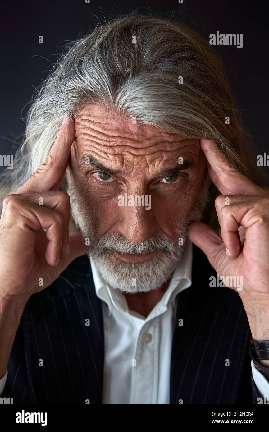 Mature male professional hand hi-res stock photography and images - Alamy