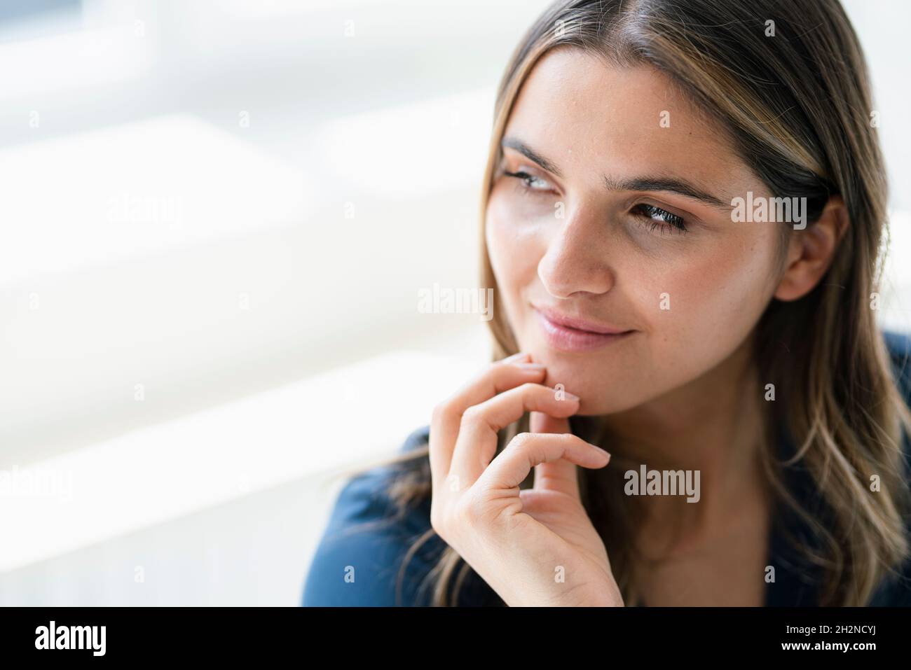 Woman young smiling thoughtful germany hi-res stock photography and ...