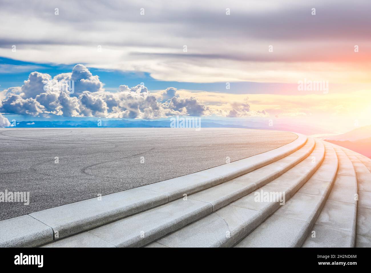 Empty race track and mountain with sky clouds landscape Stock Photo - Alamy