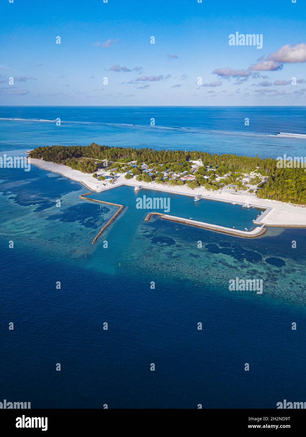 Maldives, Meemu Atoll, Veyvah, Aerial view of small inhabited island in ...