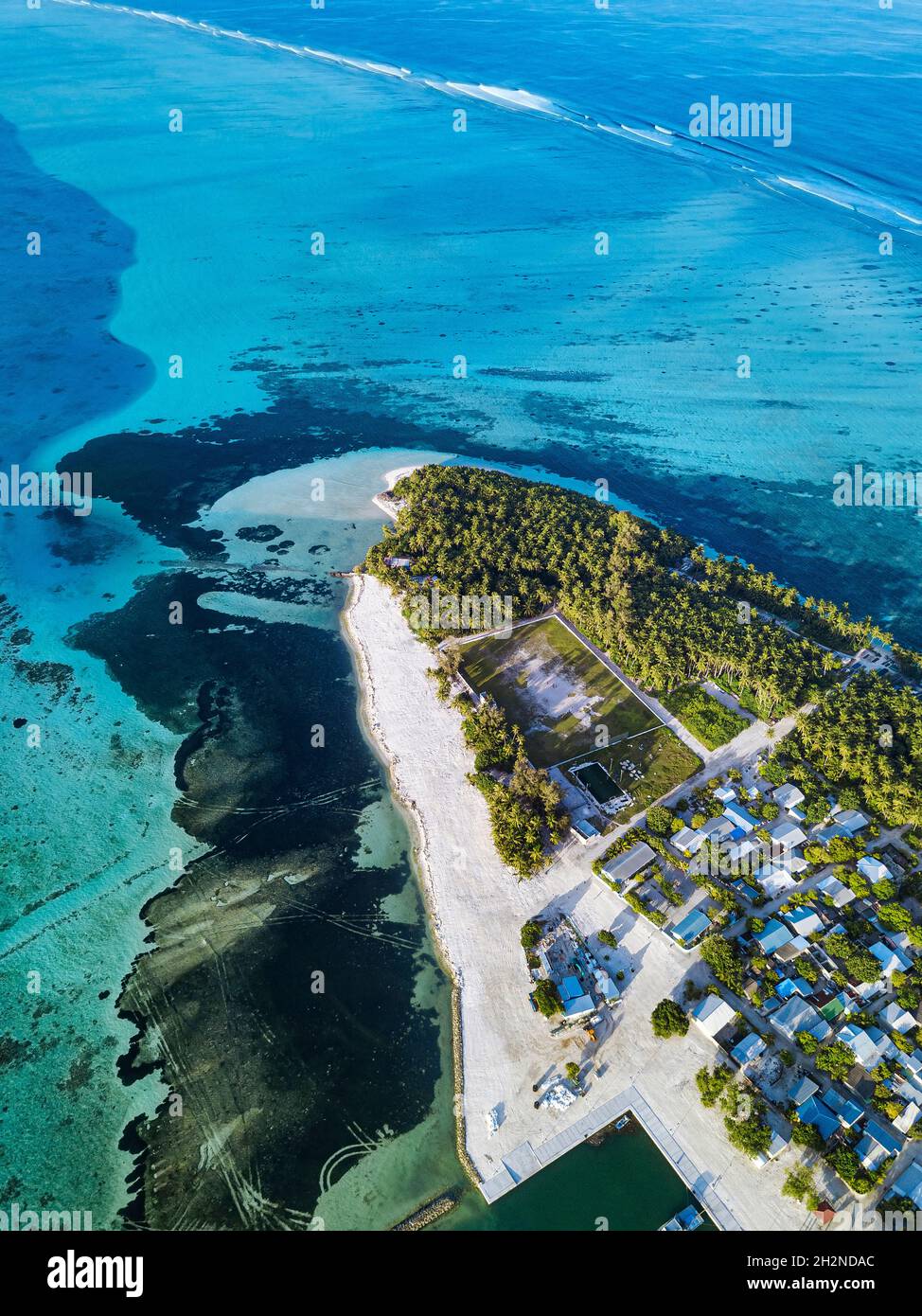 Maldives, Meemu Atoll, Veyvah, Aerial view of small inhabited island in ...