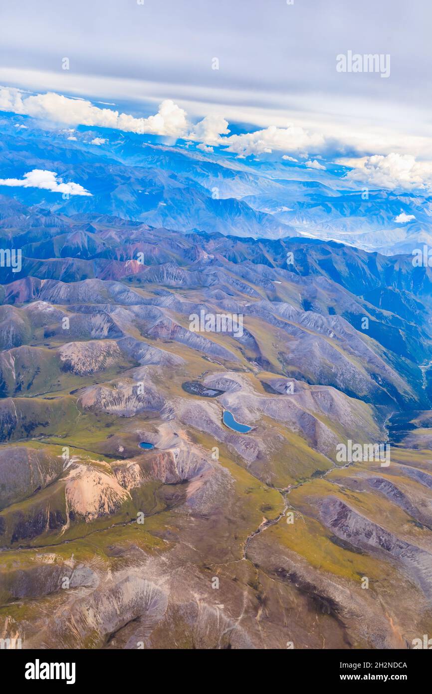 Aerial view of mountain and clouds scenery in Tibet,China Stock Photo ...