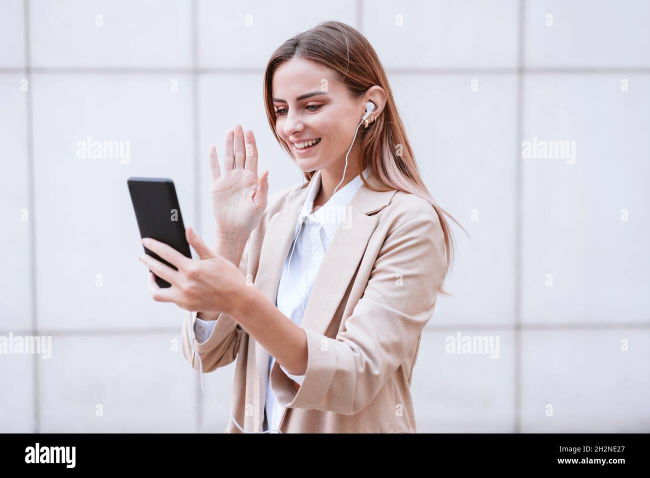 Hand holding smartphone during video hi-res stock photography and ...
