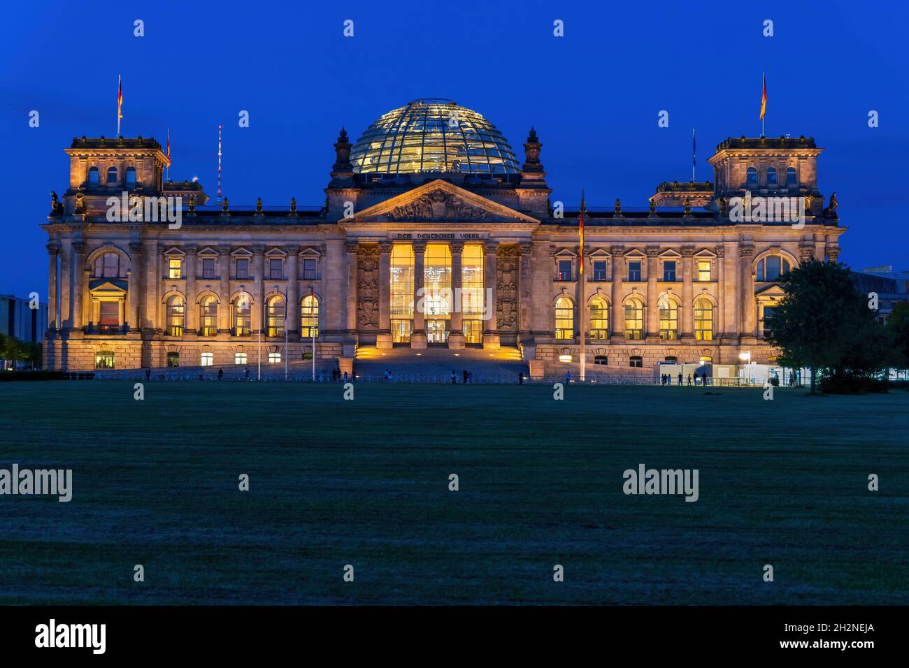 Germany, Berlin, Illuminated facade of Reichstag at night Stock Photo ...