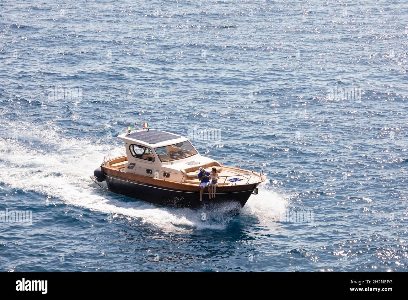 Couple motorboat hi-res stock photography and images - Alamy