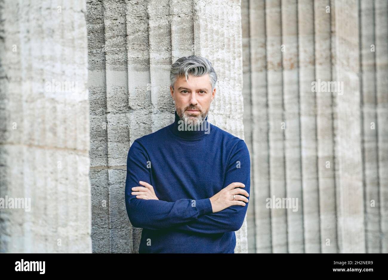 Happy man making rectangle shape with fingers Stock Photo - Alamy