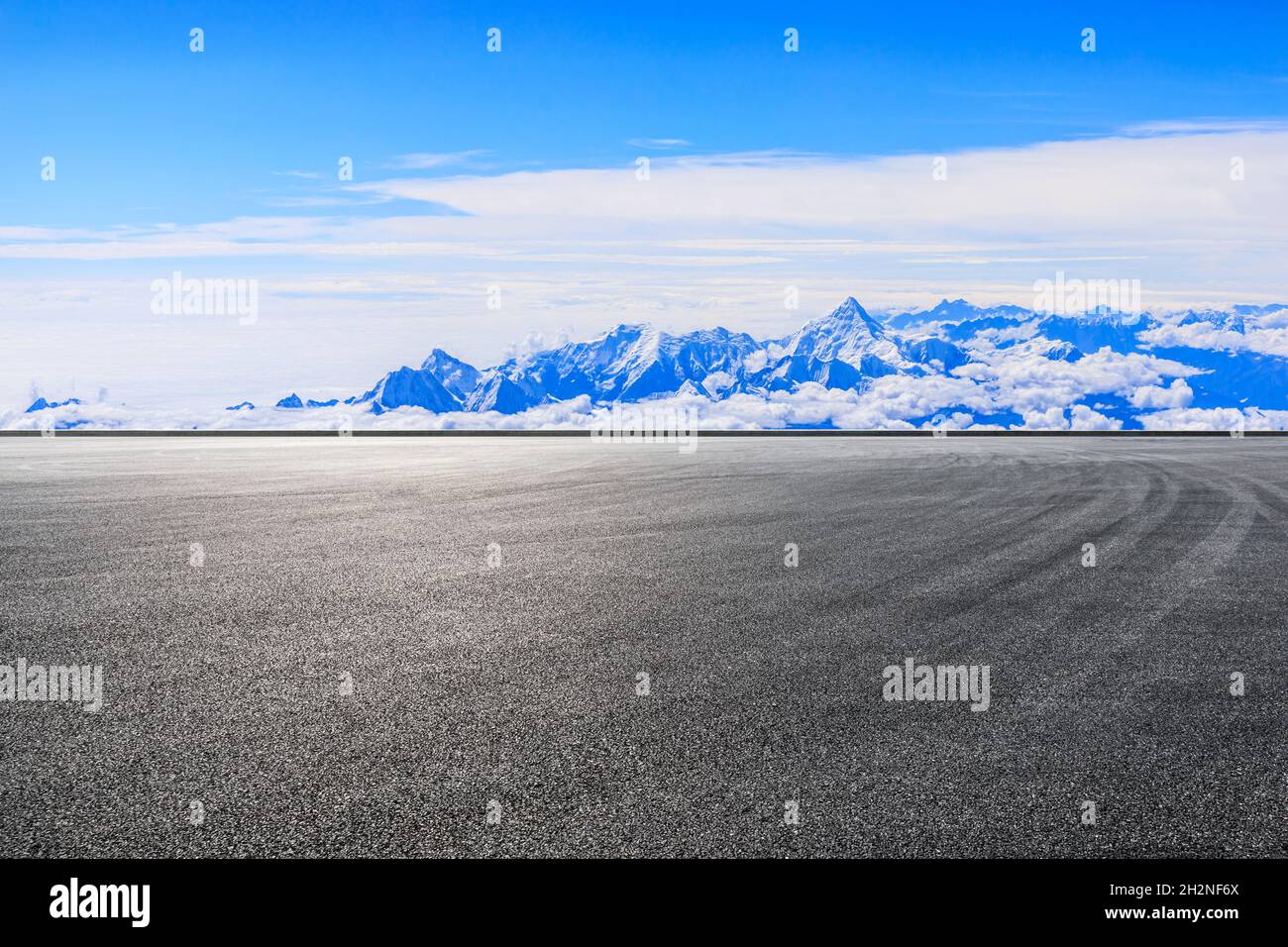 Empty race track and mountain with sky clouds landscape Stock Photo - Alamy