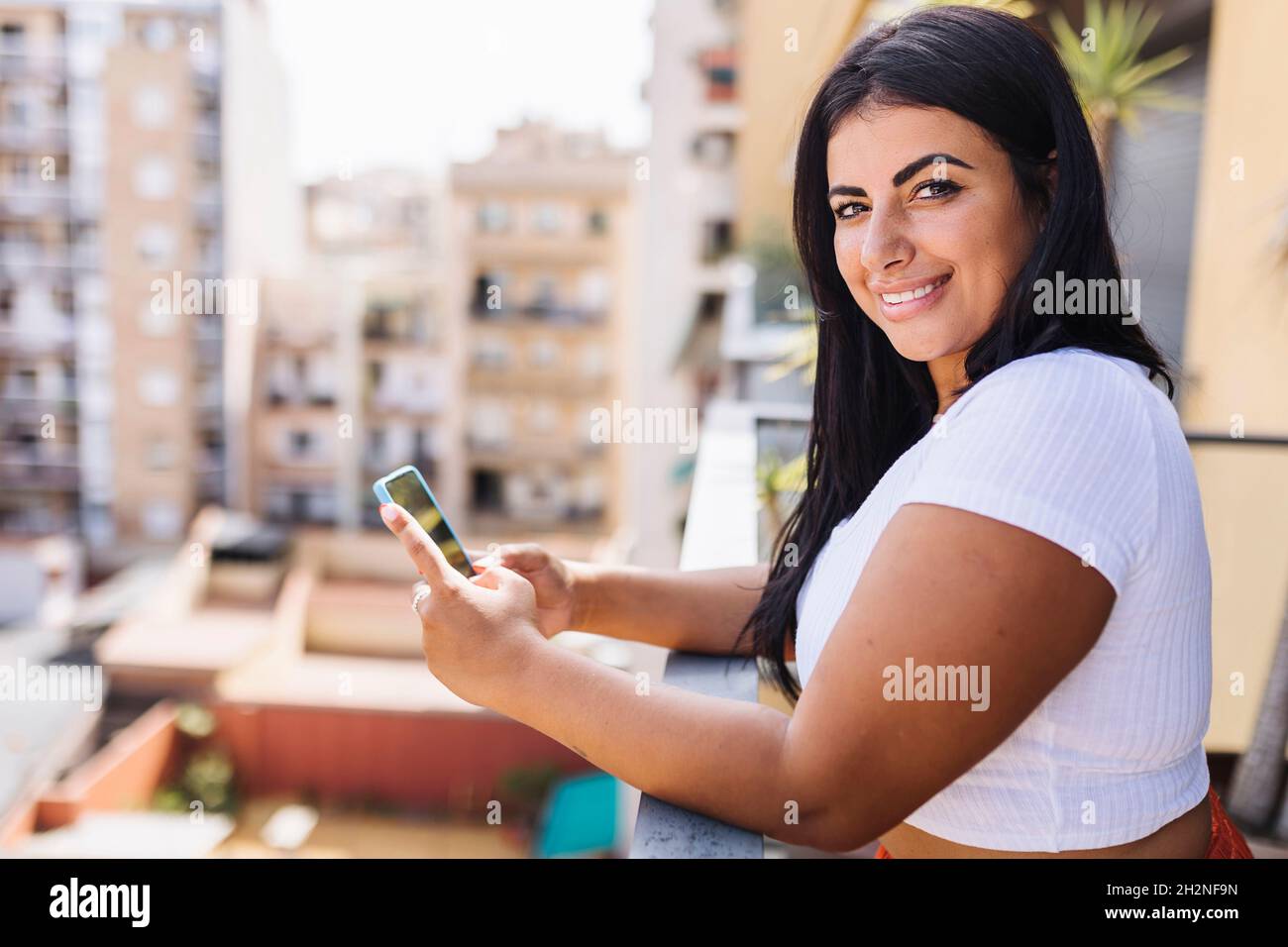 Beautiful model in balcony hi-res stock photography and images - Alamy