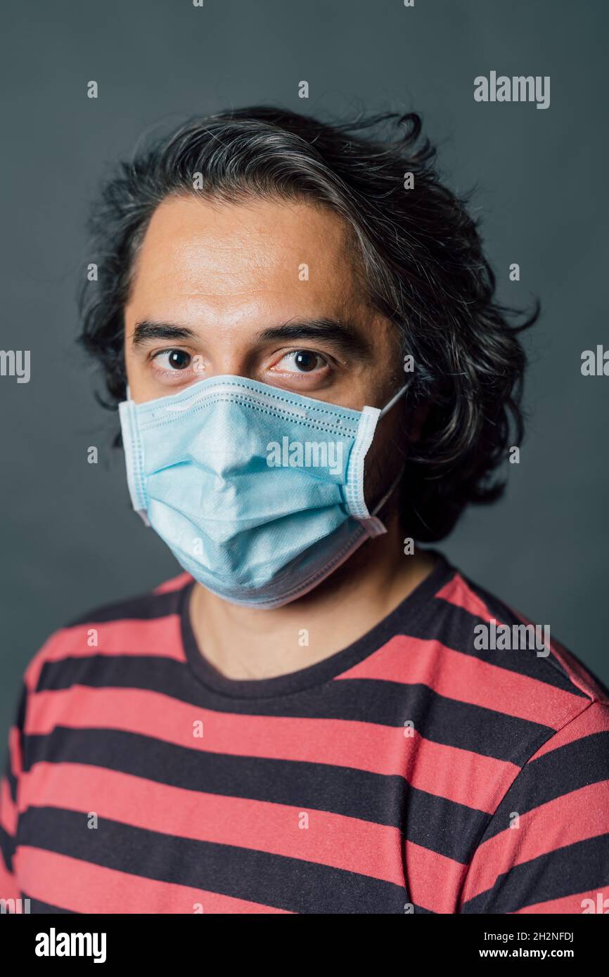 Striped face mask hi-res stock photography and images - Alamy