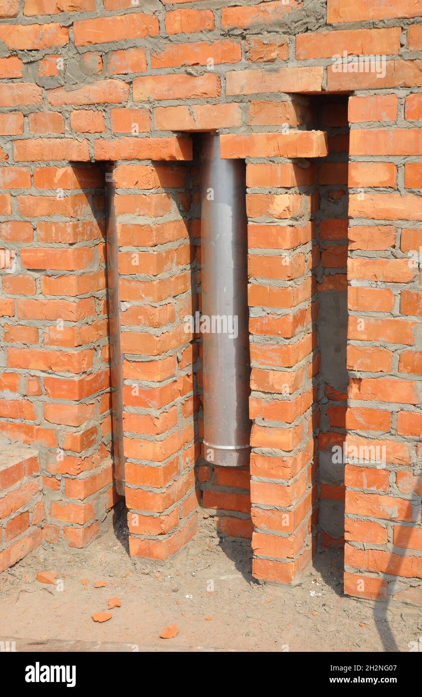 Chimney Pipe installation in brick wall. Direct Vent Fireplace Pipes ...
