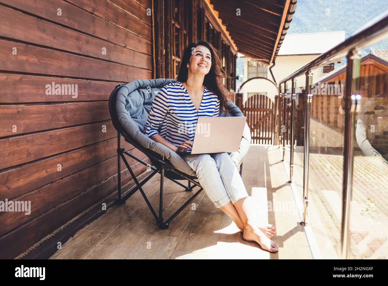 Woman legs up chair hi-res stock photography and images - Alamy