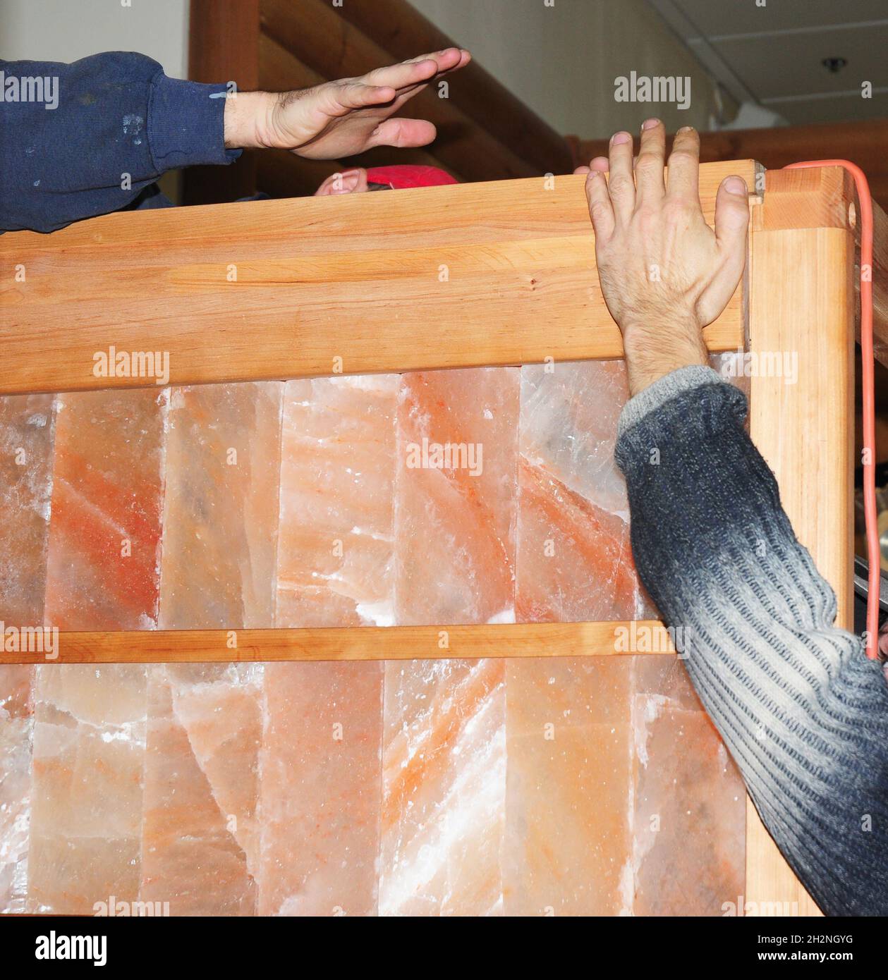 Installing Dry Salt Sauna with wooden and himalayan salt walls Stock ...