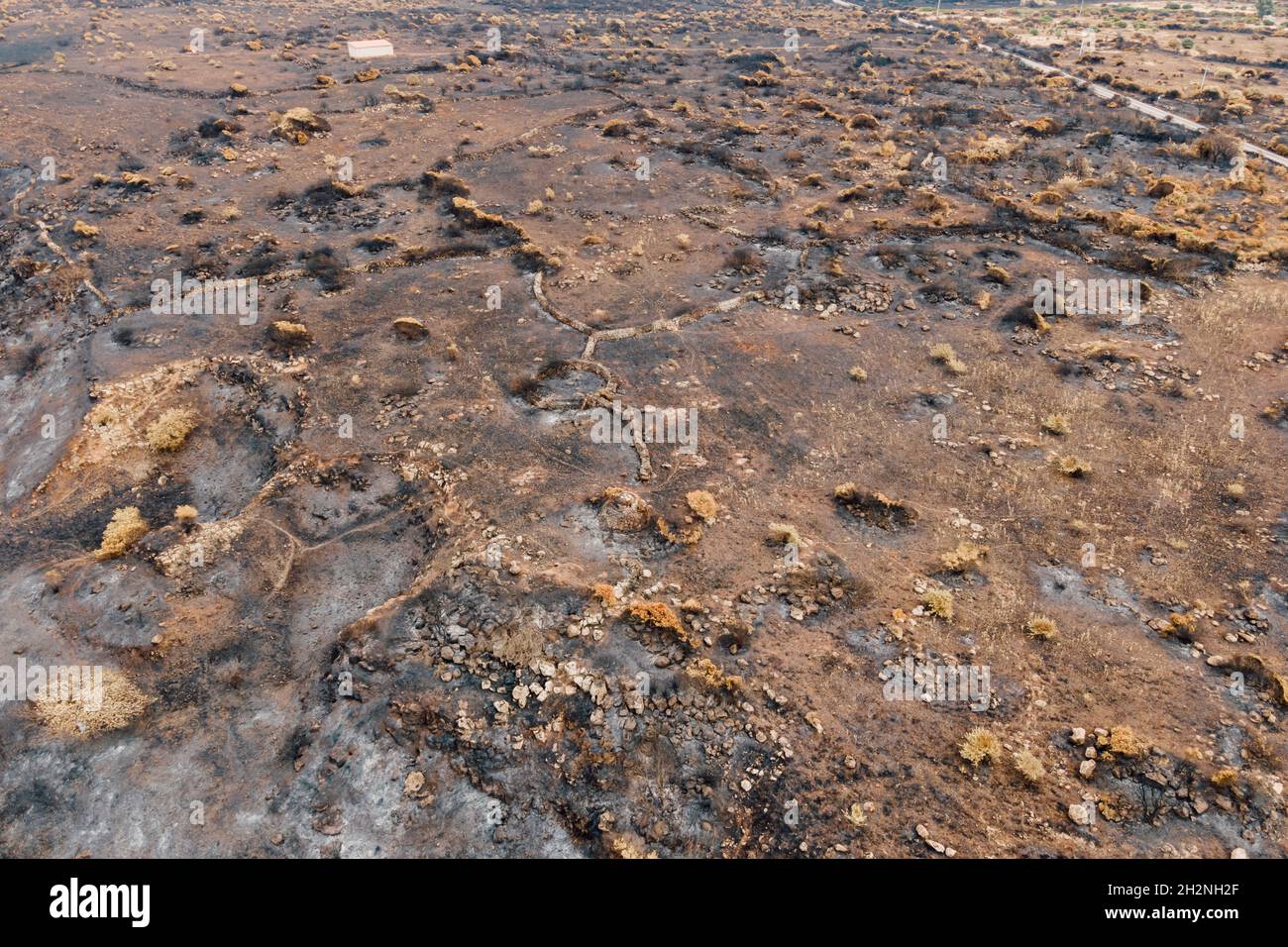 Aerial view of brown barren landscape after wildfire Stock Photo - Alamy