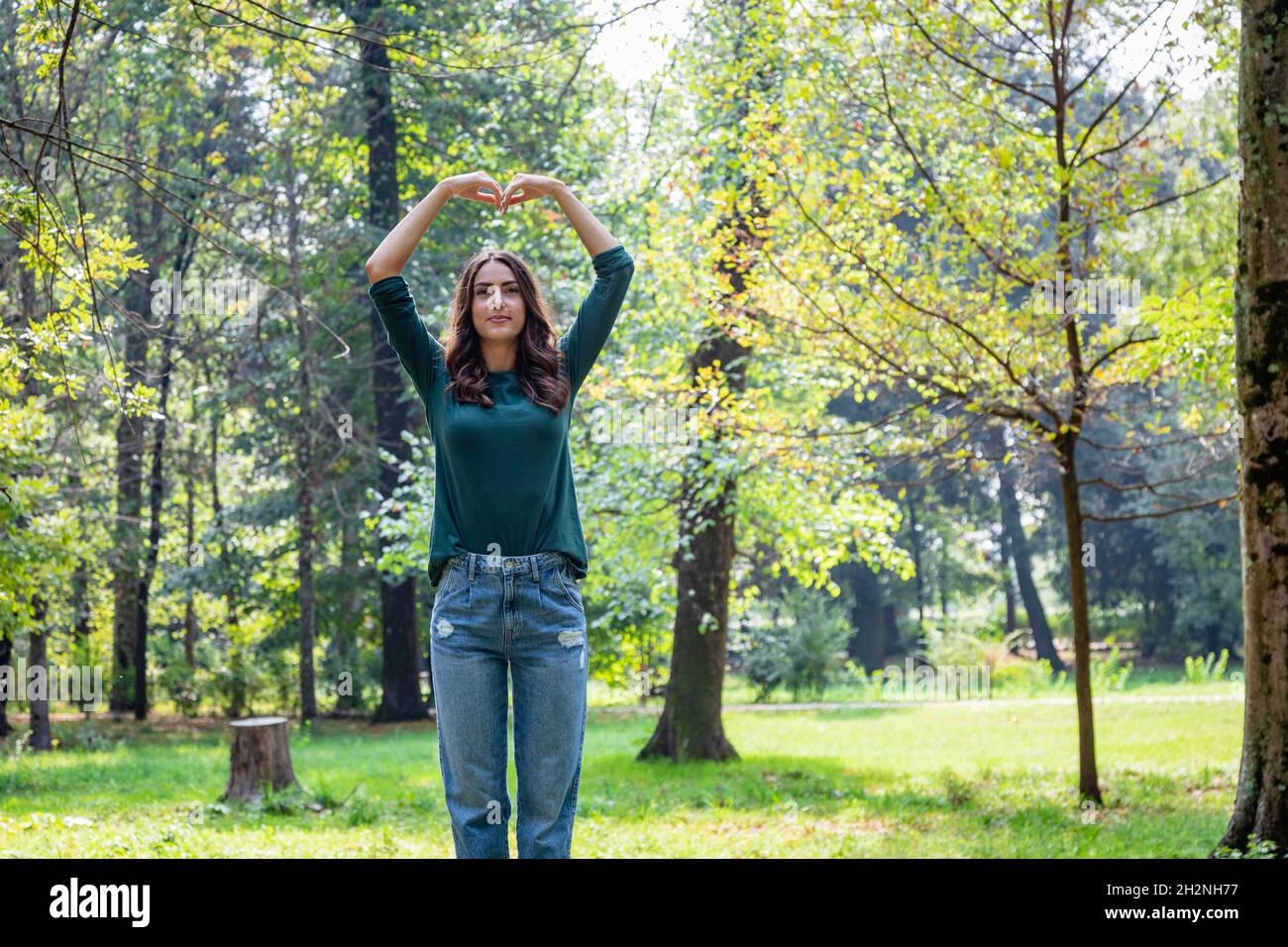 Making heart with arms hi-res stock photography and images - Alamy