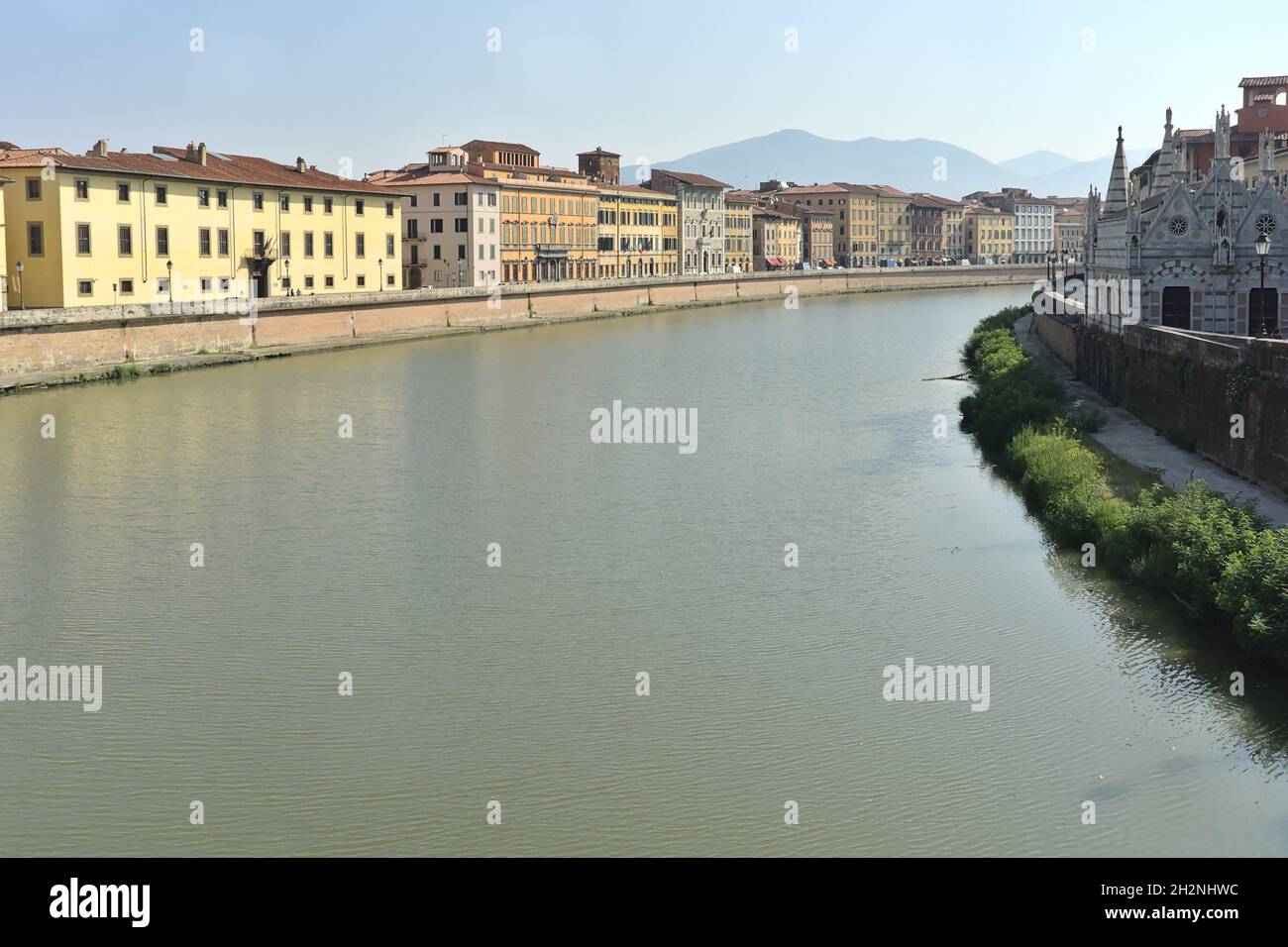 PISA, ITALY - Sep 03, 2019: A beautiful view of River Arno and road ...