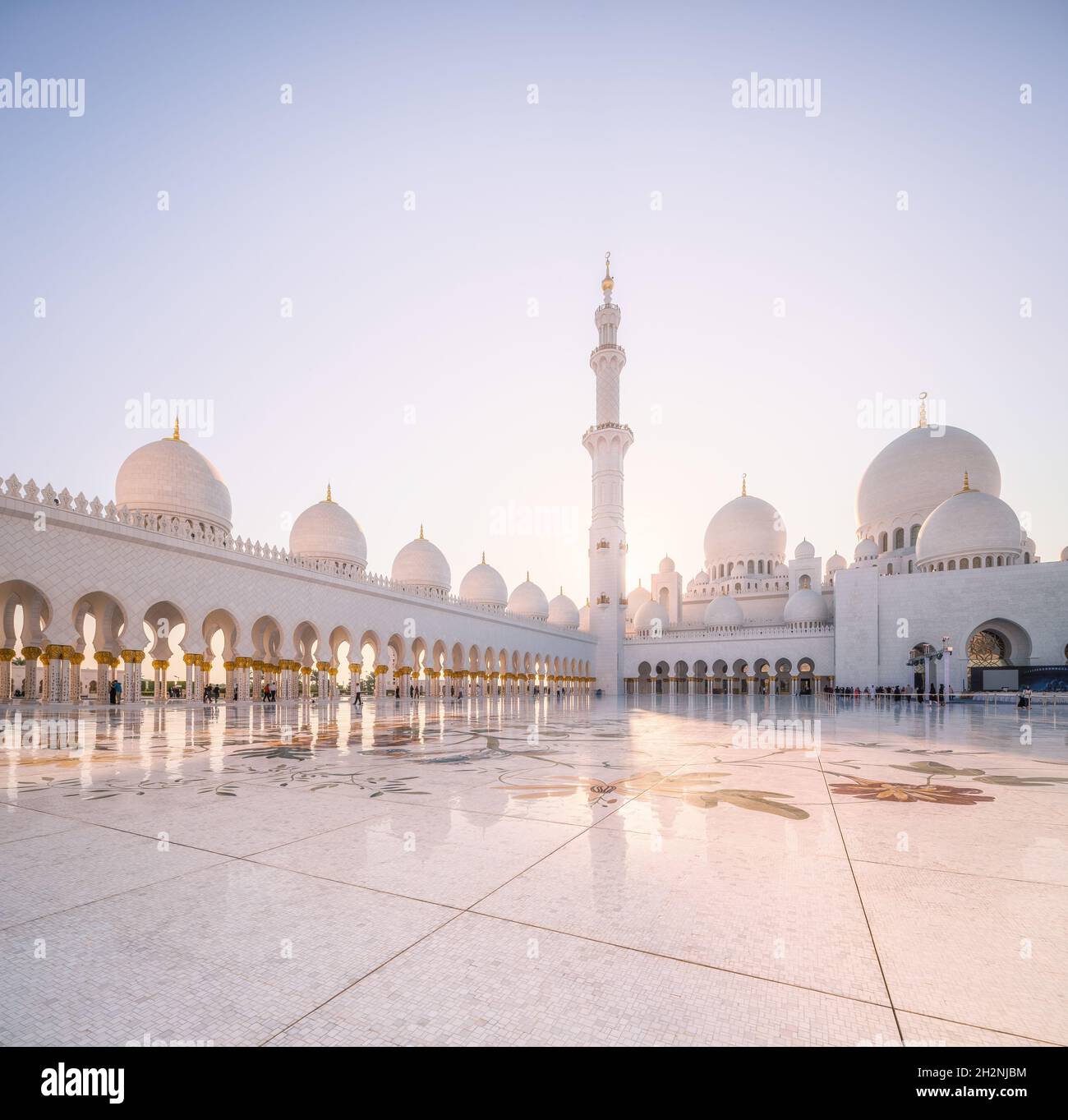 Sheikh Zayed Grand Mosque in Abu Dhabi during pink sunset. View of ...