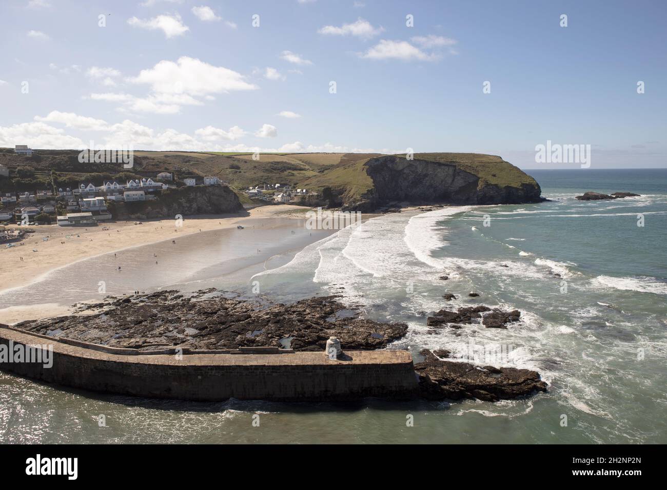 Aerial view of the beach and harbour entrance at Portreath, Cornwall ...