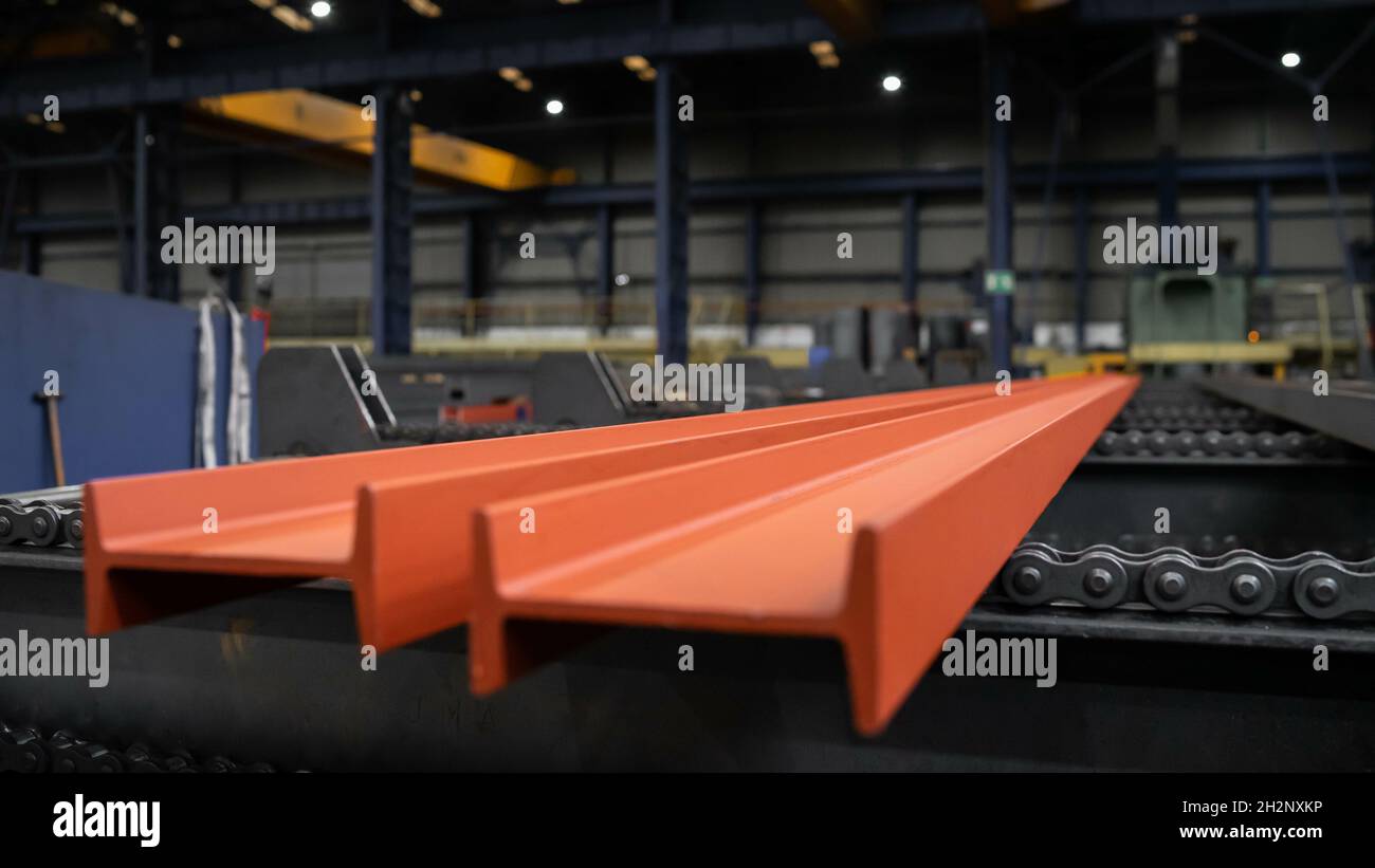Closeup of orange I-beams in a factory Stock Photo - Alamy