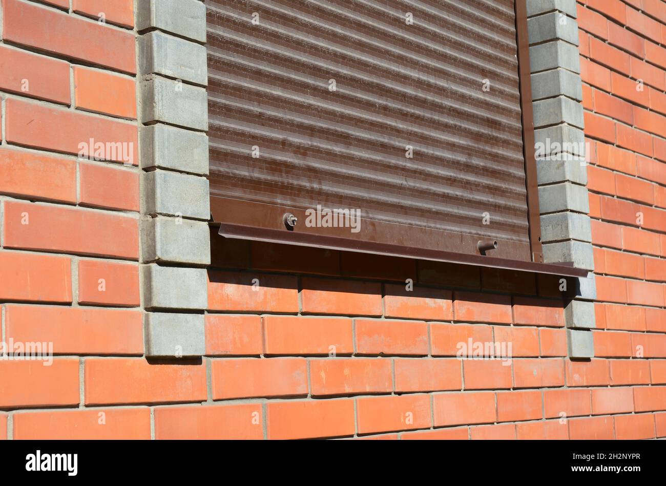 Window with rolling shutter for house protection Stock Photo - Alamy
