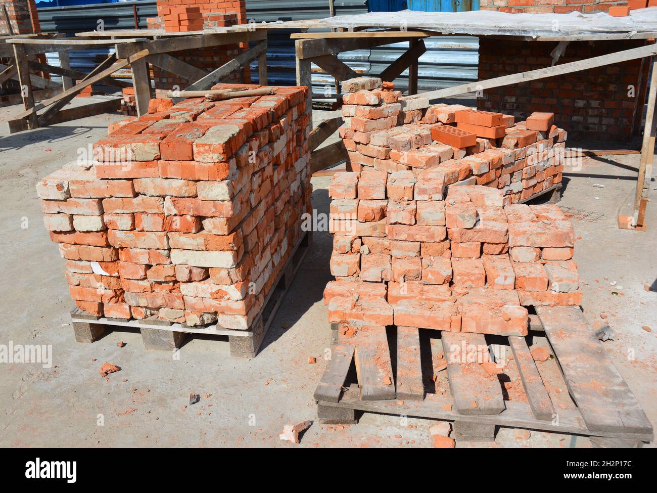 Brick building materials on the construction site Stock Photo - Alamy