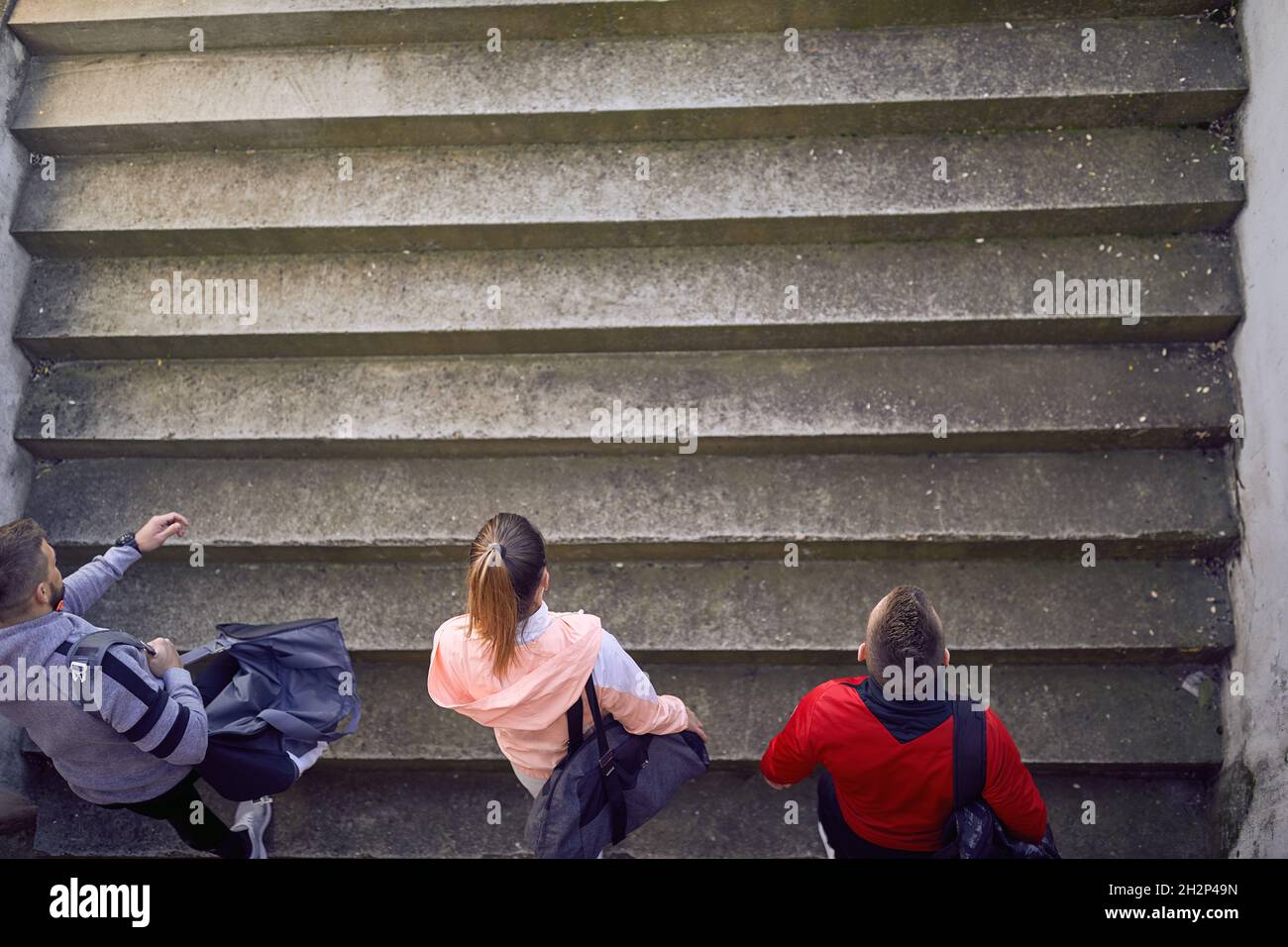 Group of athletes going to the practice together Stock Photo - Alamy
