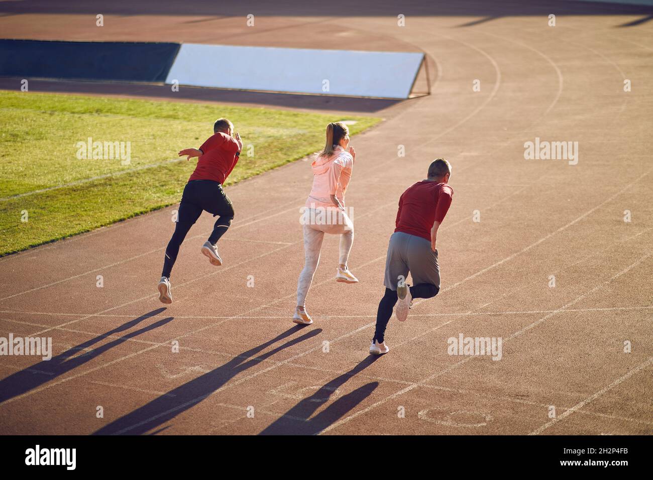 Group of professional athletes training for the race together Stock ...