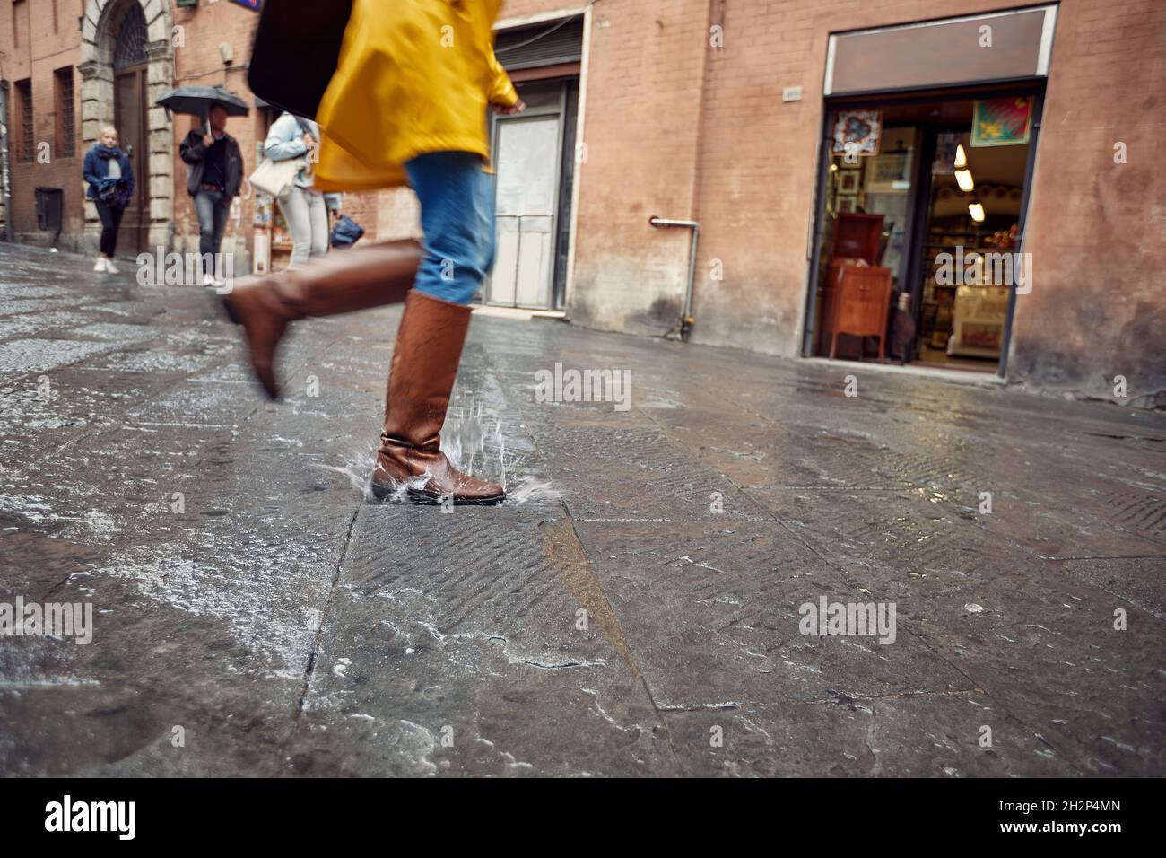 Adult female jump puddle hi-res stock photography and images - Alamy