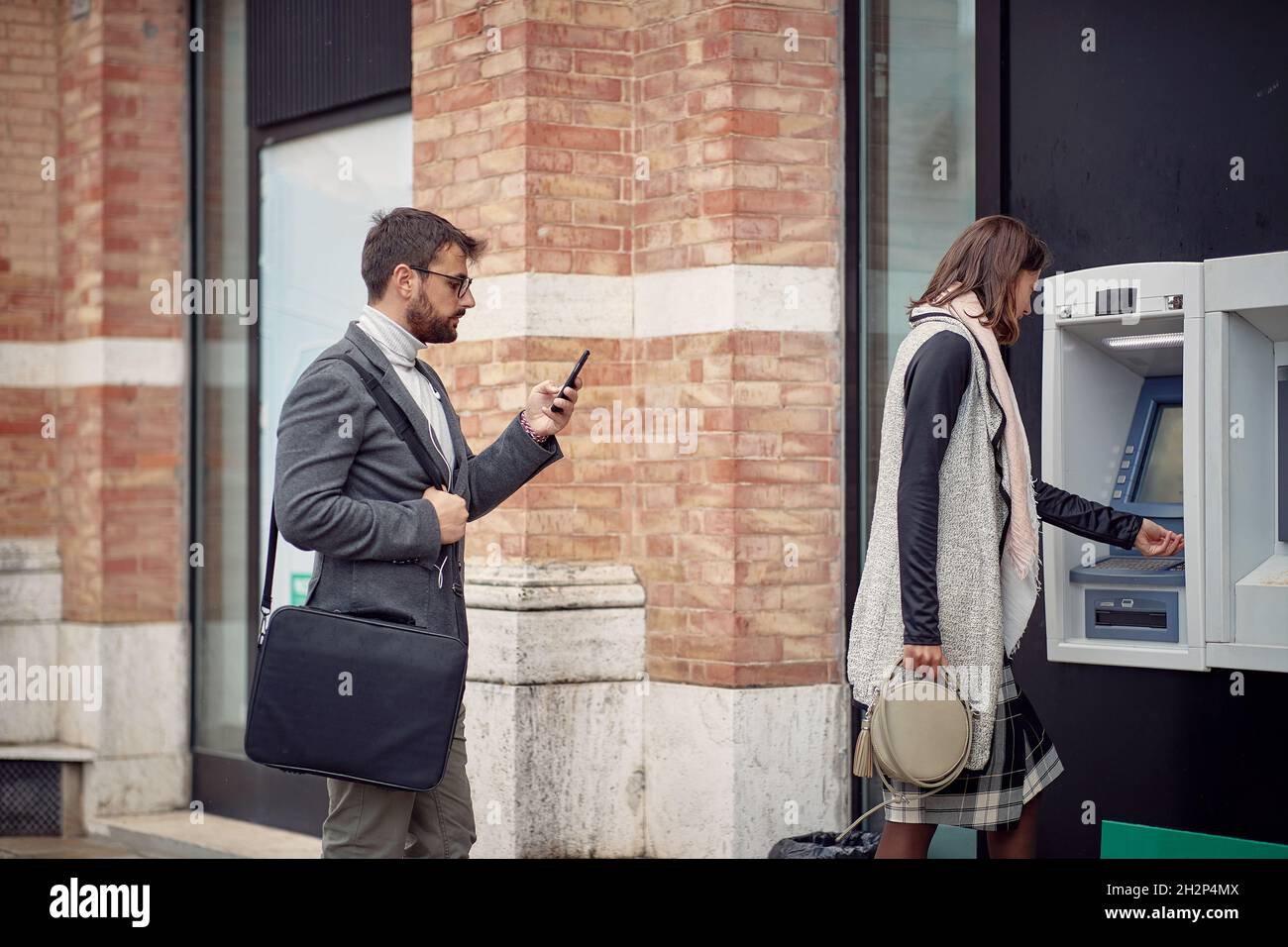 Male withdrawing cash at atm hi-res stock photography and images - Alamy