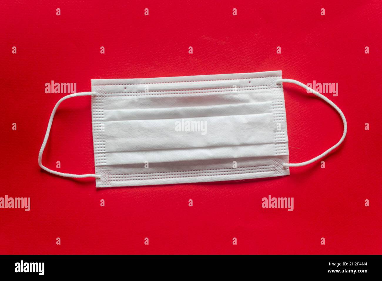 Medical mask, medical protective mask, surgical face mask on red ...