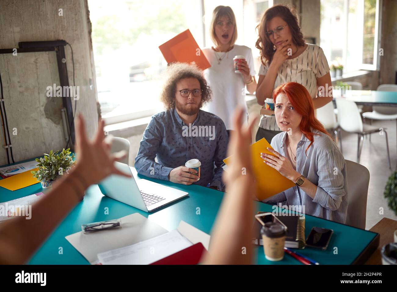 Mad boss yelling at the employess at the office Stock Photo - Alamy