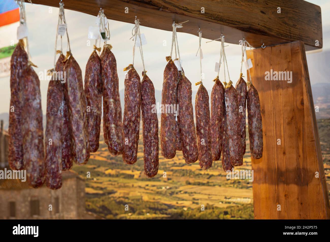 Group of Hanging Salami inside Butcher Shop Stock Photo - Alamy