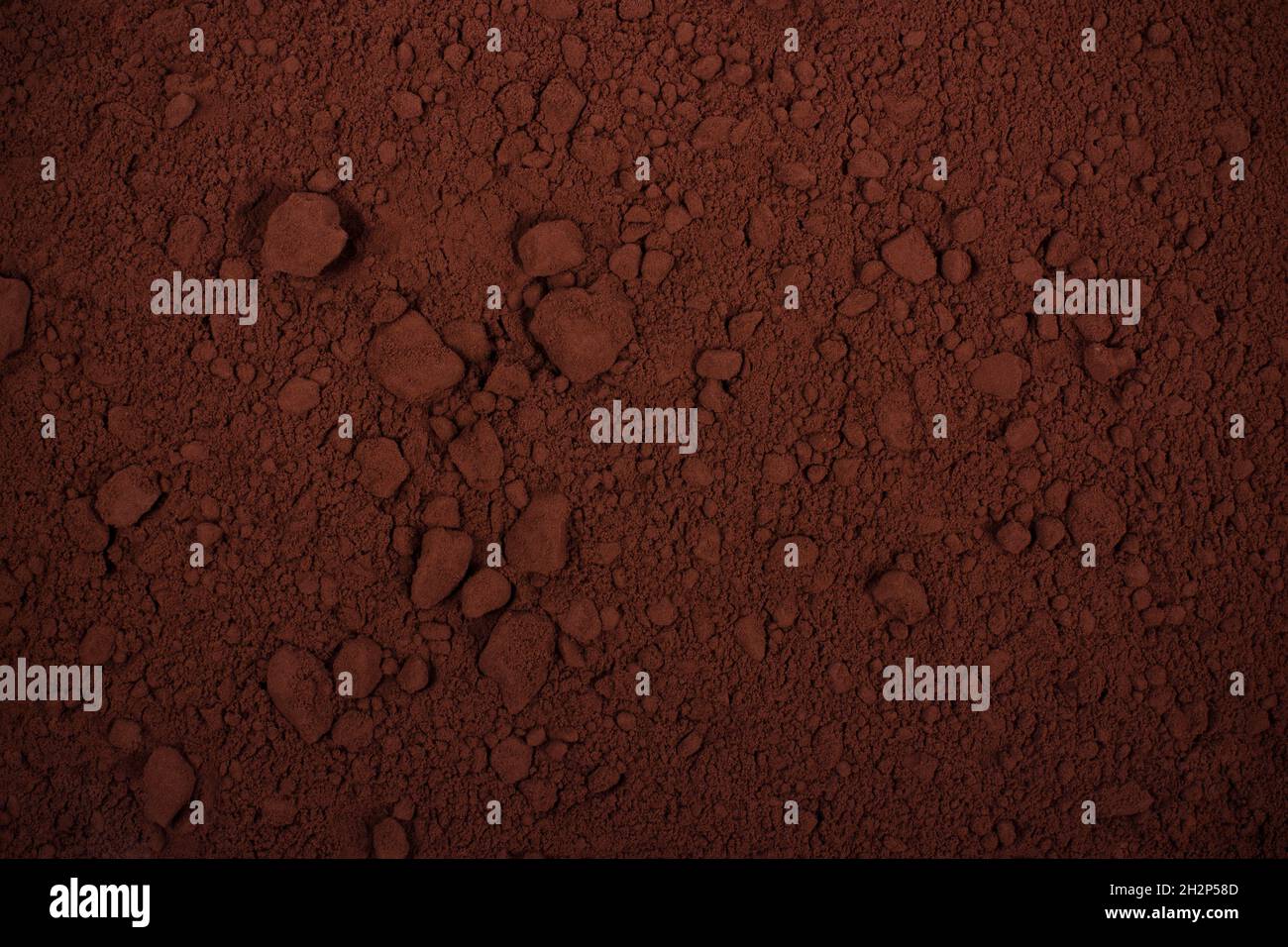 Top view on cocoa powder close up background Stock Photo - Alamy
