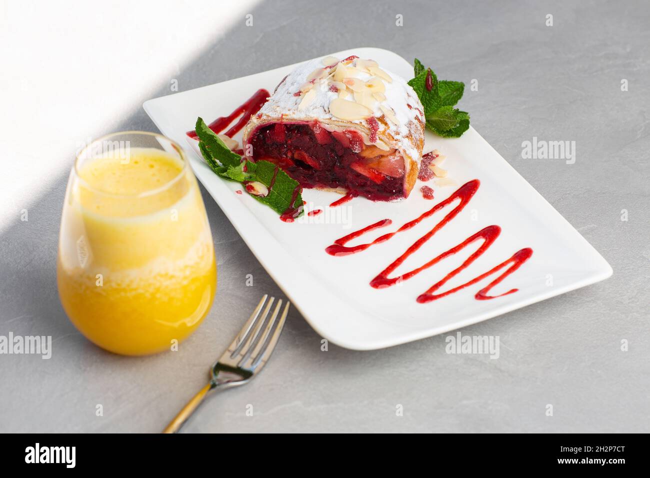 Homemade Traditional Austrian strudel with cherry or red berries and ...