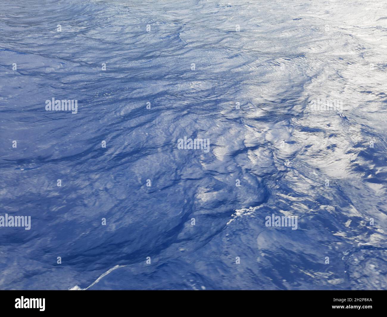 Abstract background. Waves of sea water on the surface of the Aegean ...
