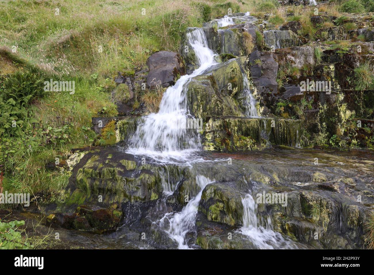Cascading stream near the village of Bour, Vagar Island, Faroe Islands ...