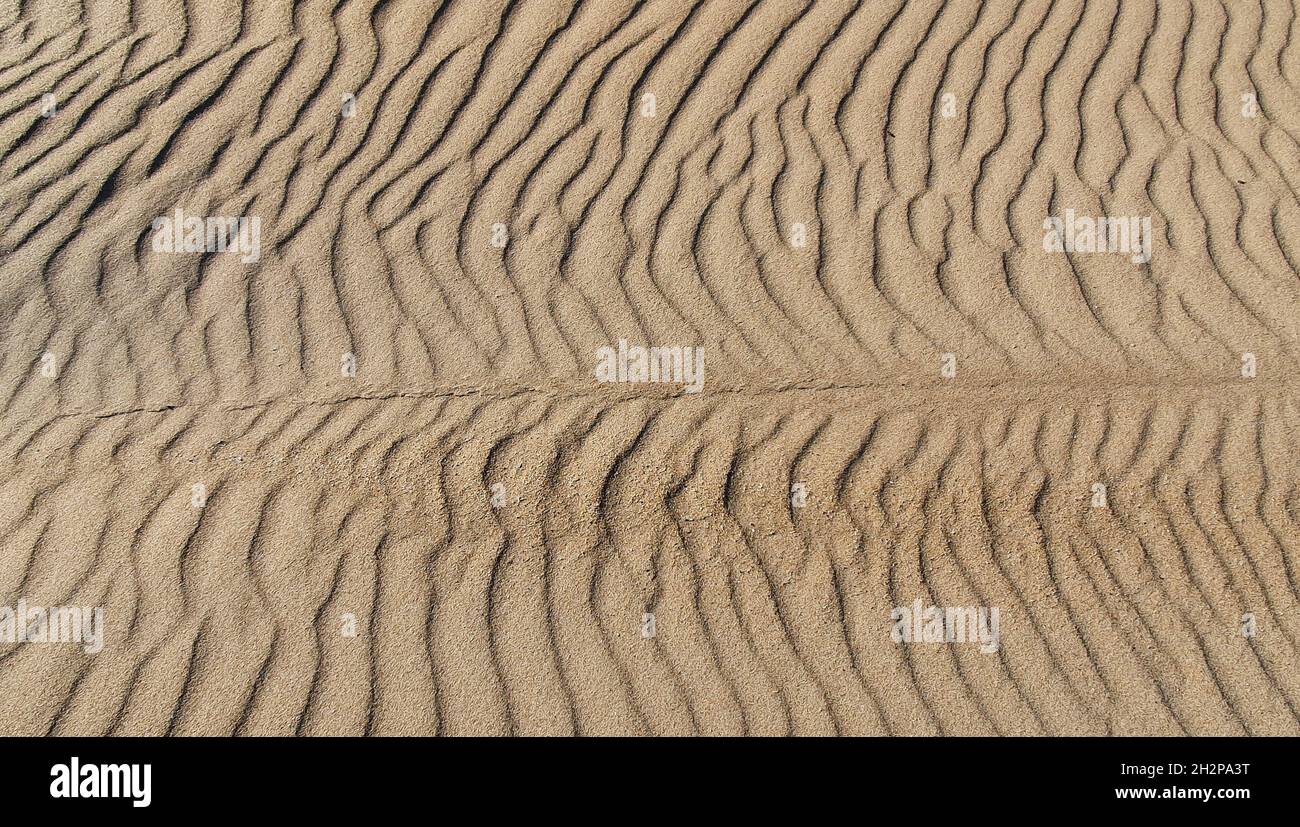Patterns and texture in sand Stock Photo - Alamy