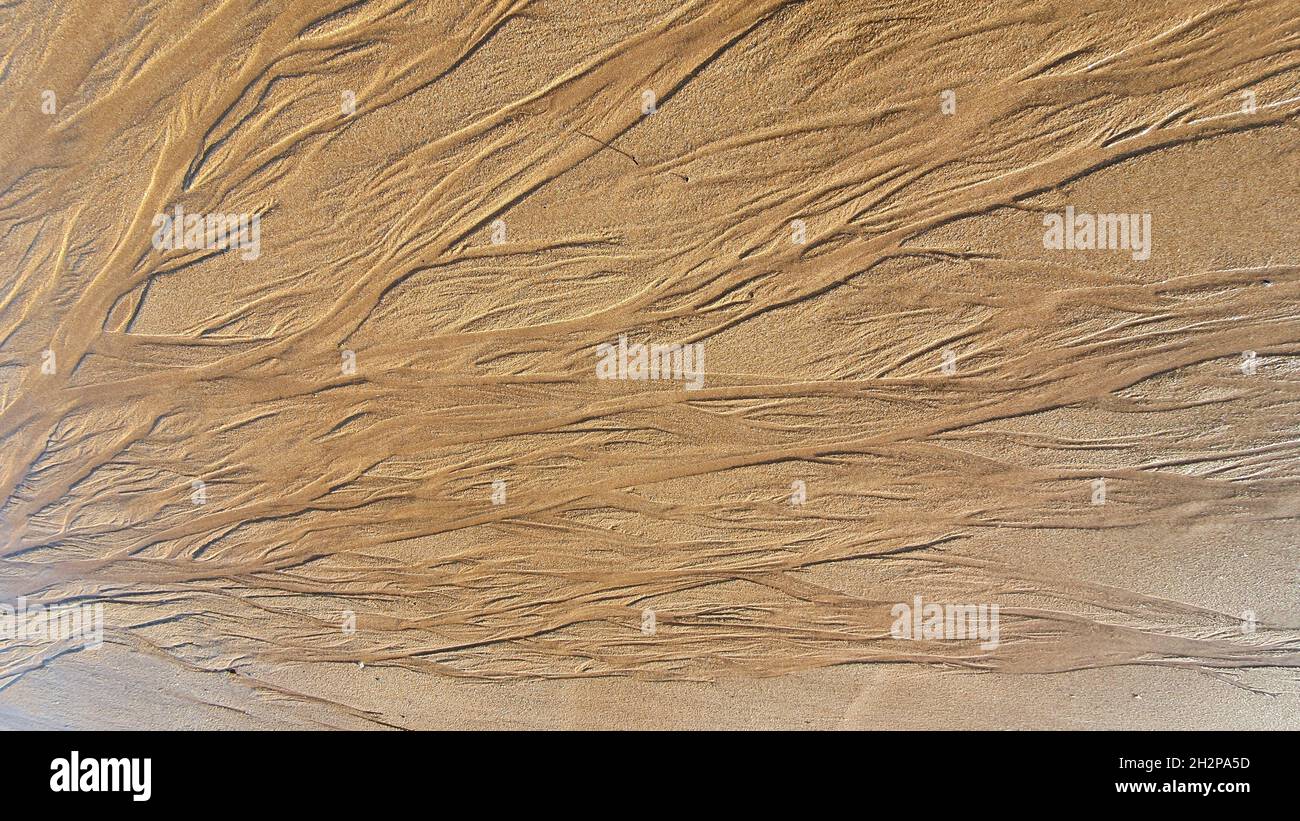 Patterns and texture in sand Stock Photo - Alamy