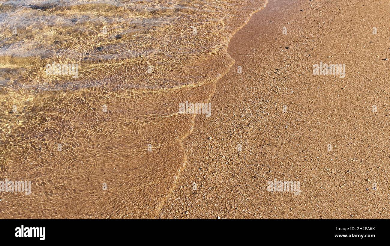 Pattern and textures in sand Stock Photo - Alamy