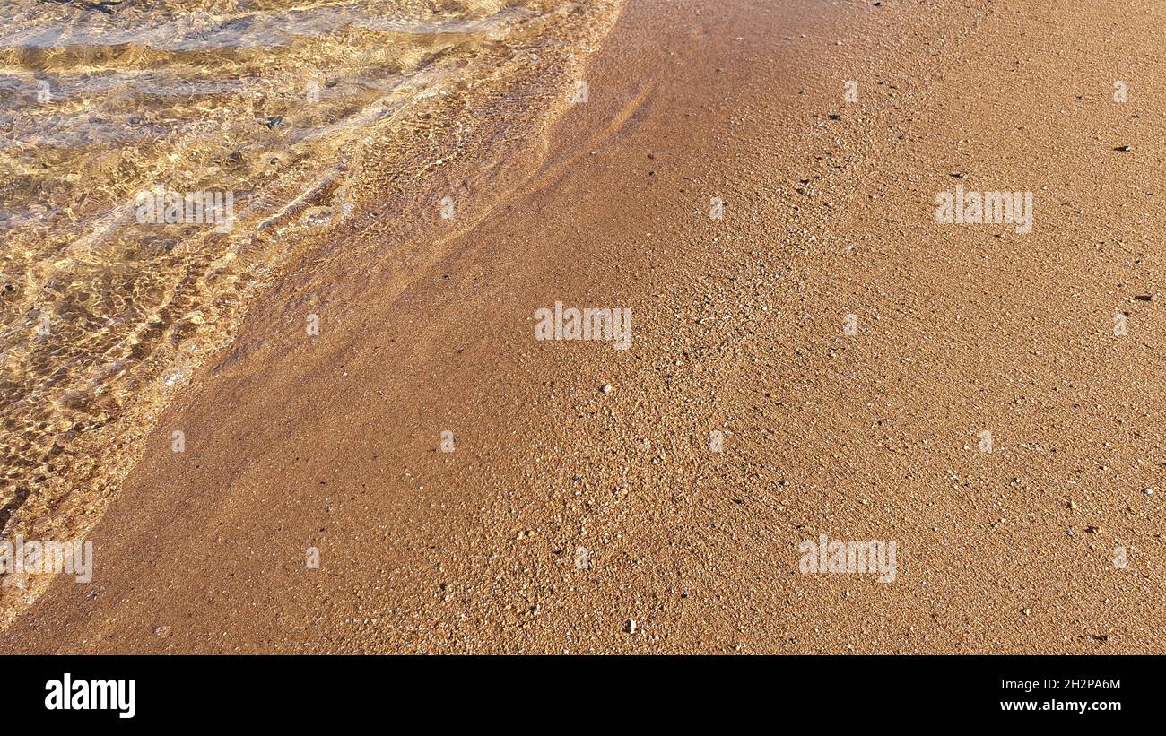 Pattern and textures in sand Stock Photo - Alamy