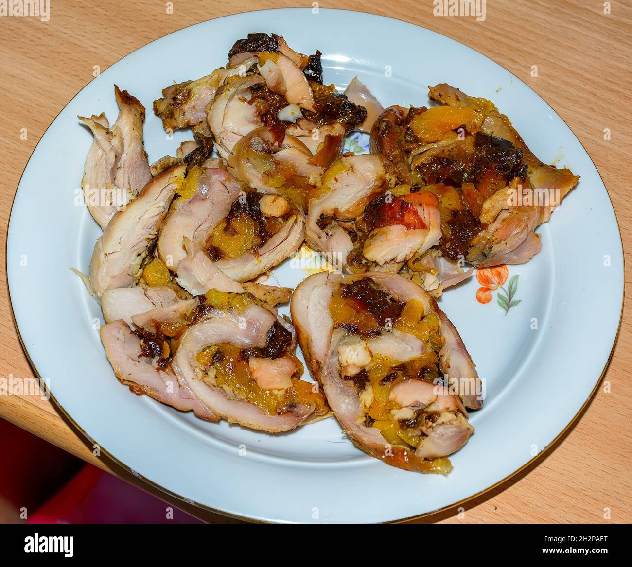 Festive dishes on the New Year's table. Turkey roll with prunes Stock ...